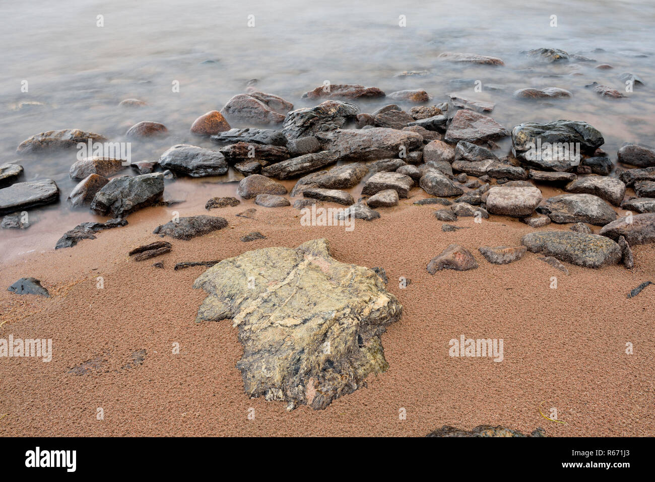 Ennadai Lake shoreline with beachstones and waves, Arctic Haven Lodge ...