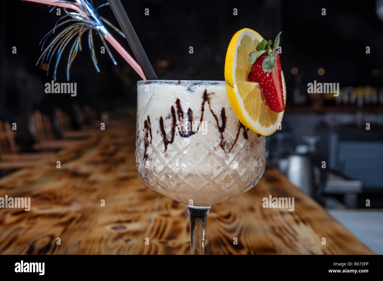 Alcoholic cocktail row on bar table, colorful party drinks Stock Photo ...