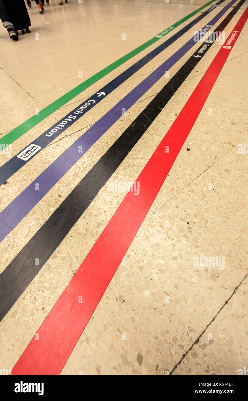 Direction lines on train station Stock Photo - Alamy