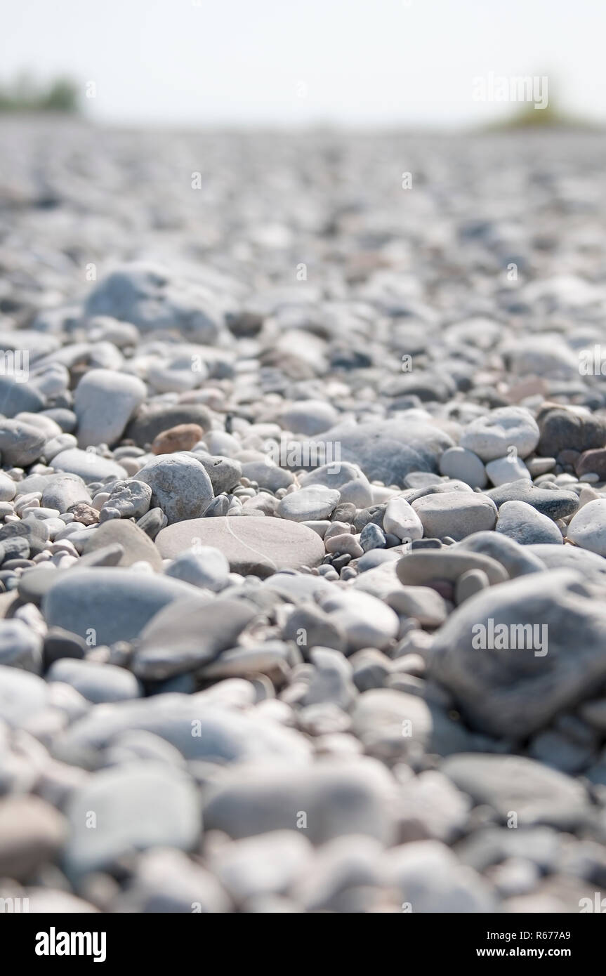 pebbles in the riverbed Stock Photo - Alamy