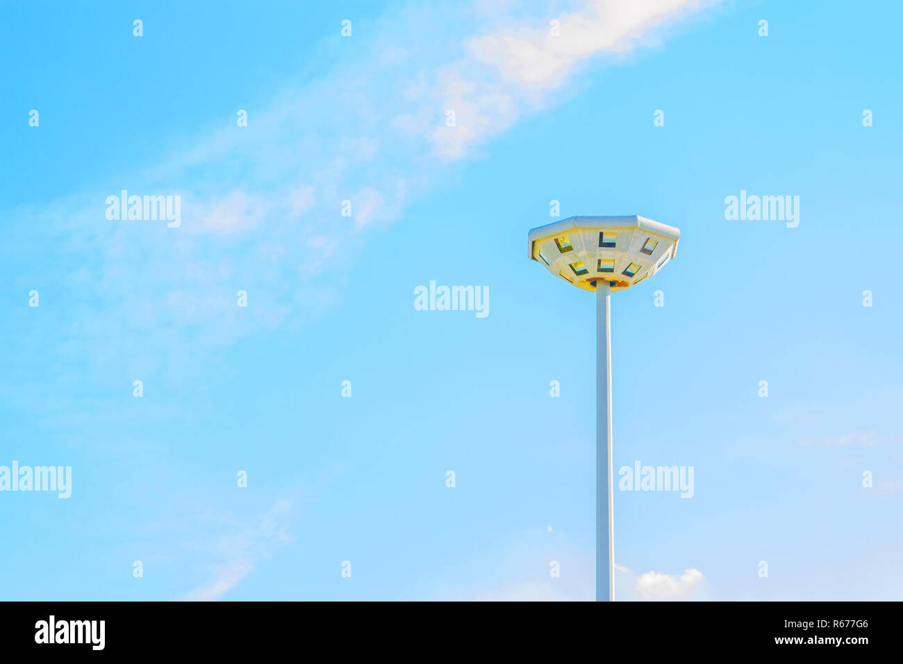 Light pole in the blue sky Stock Photo - Alamy