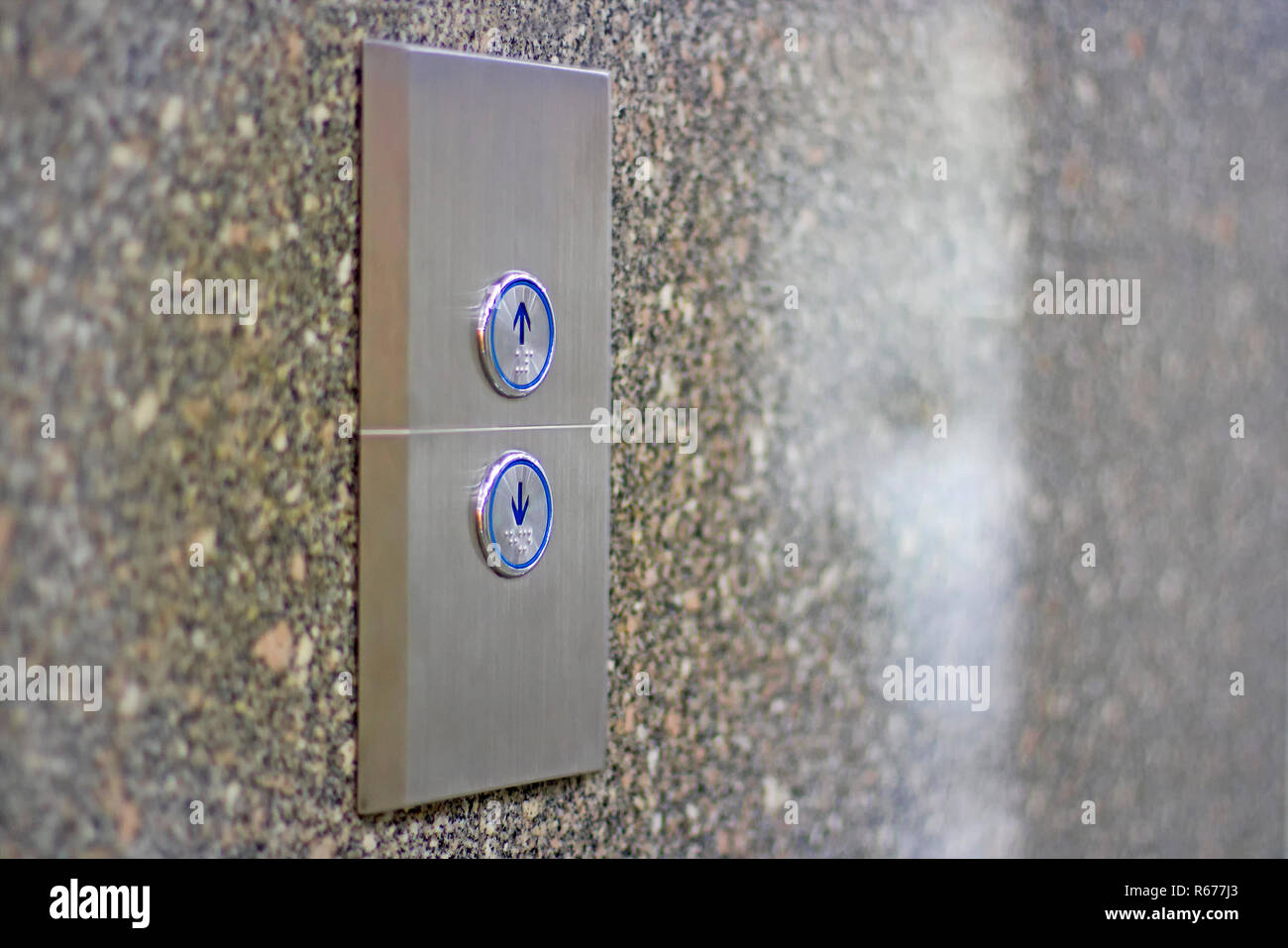 Press the elevator up and keypad elevator Stock Photo - Alamy