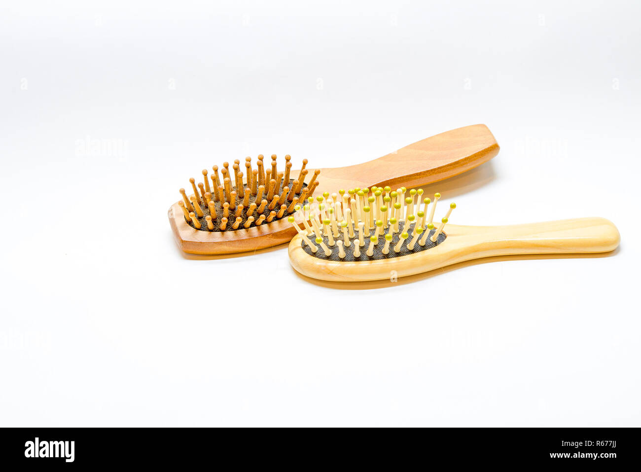 Hair brush comb with scraping hair on a white background Stock Photo ...