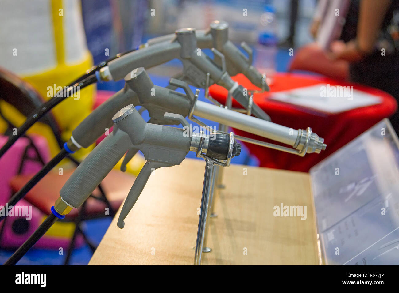Many sandblasting guns are located on the table Stock Photo - Alamy