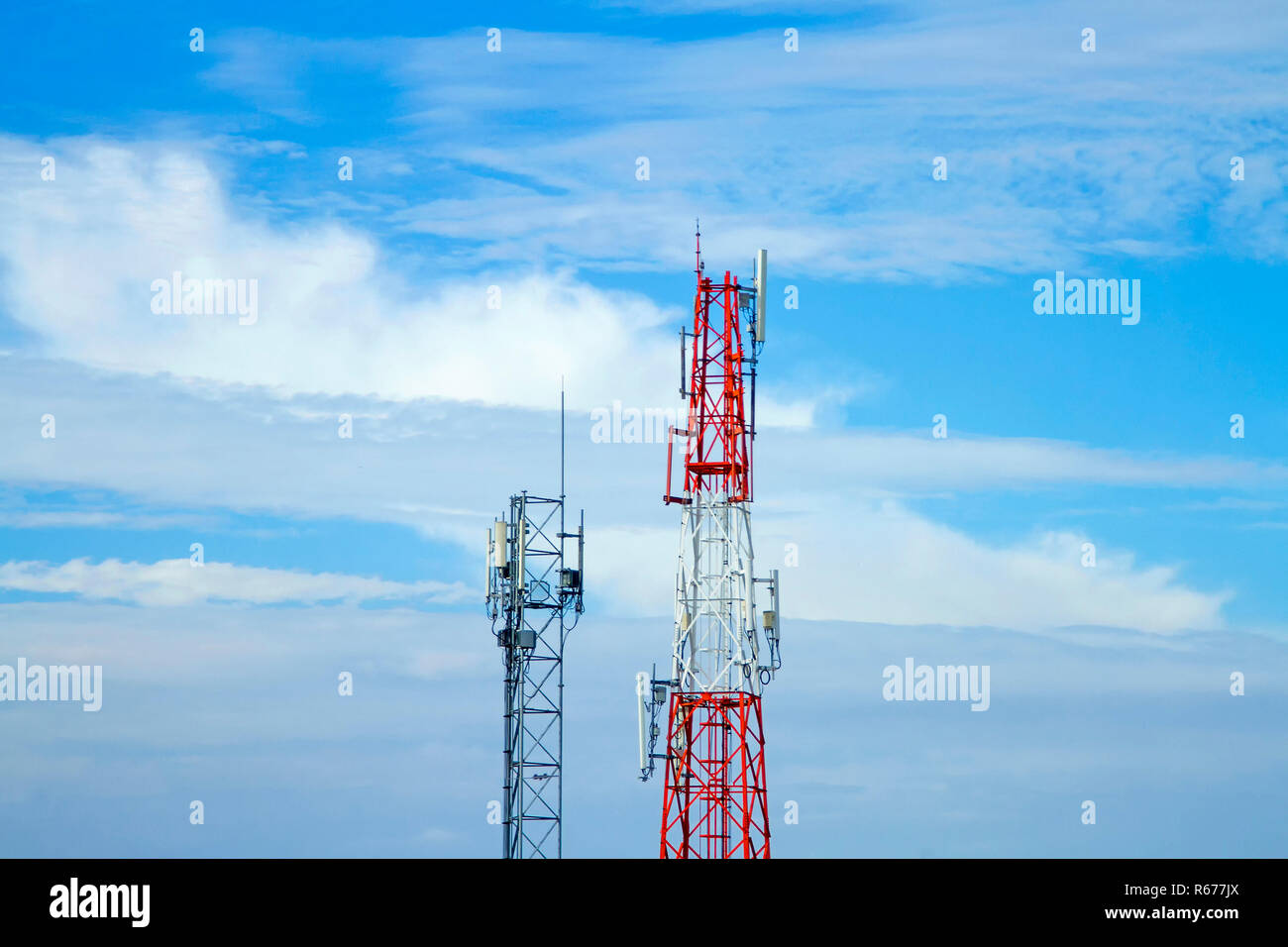 Mobile phone communication tower transmission signal with blue sky ...