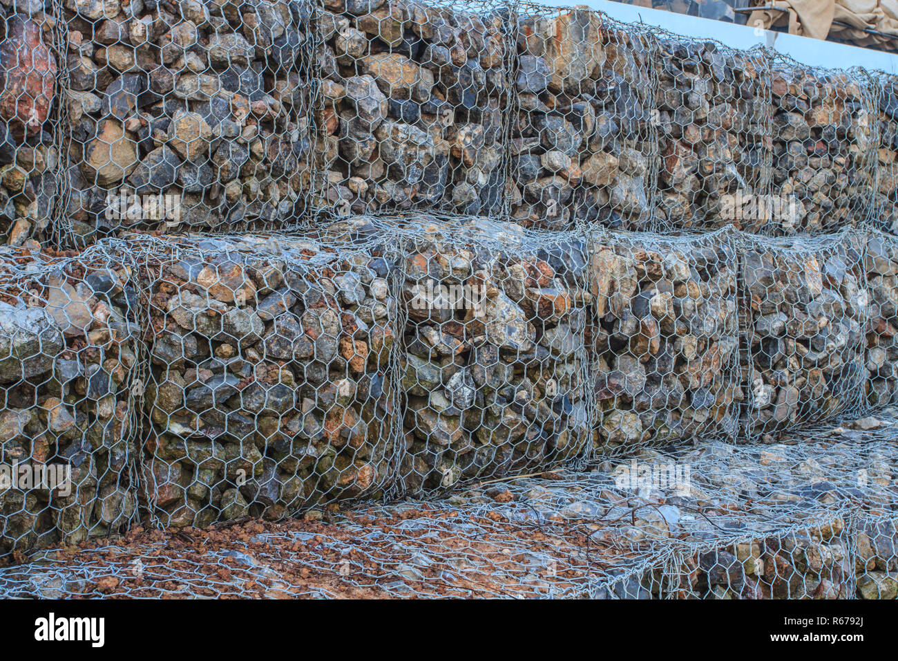 Cobble stone mole in sea Stock Photo - Alamy