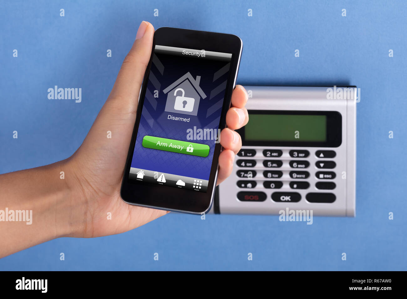 Person Arming Security System Of Door Stock Photo - Alamy