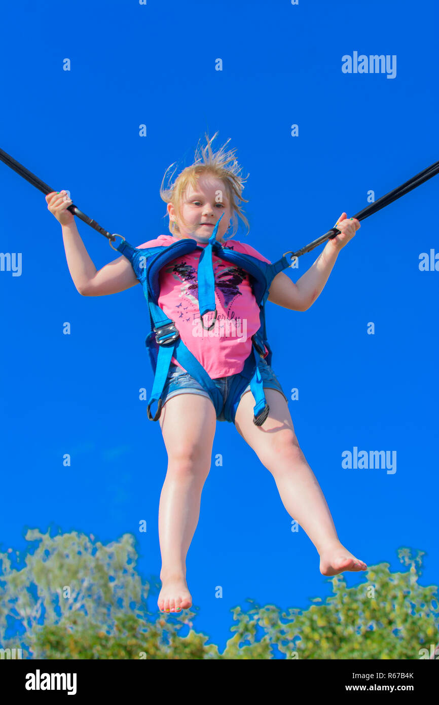 Children jumping rope hi-res stock photography and images - Alamy