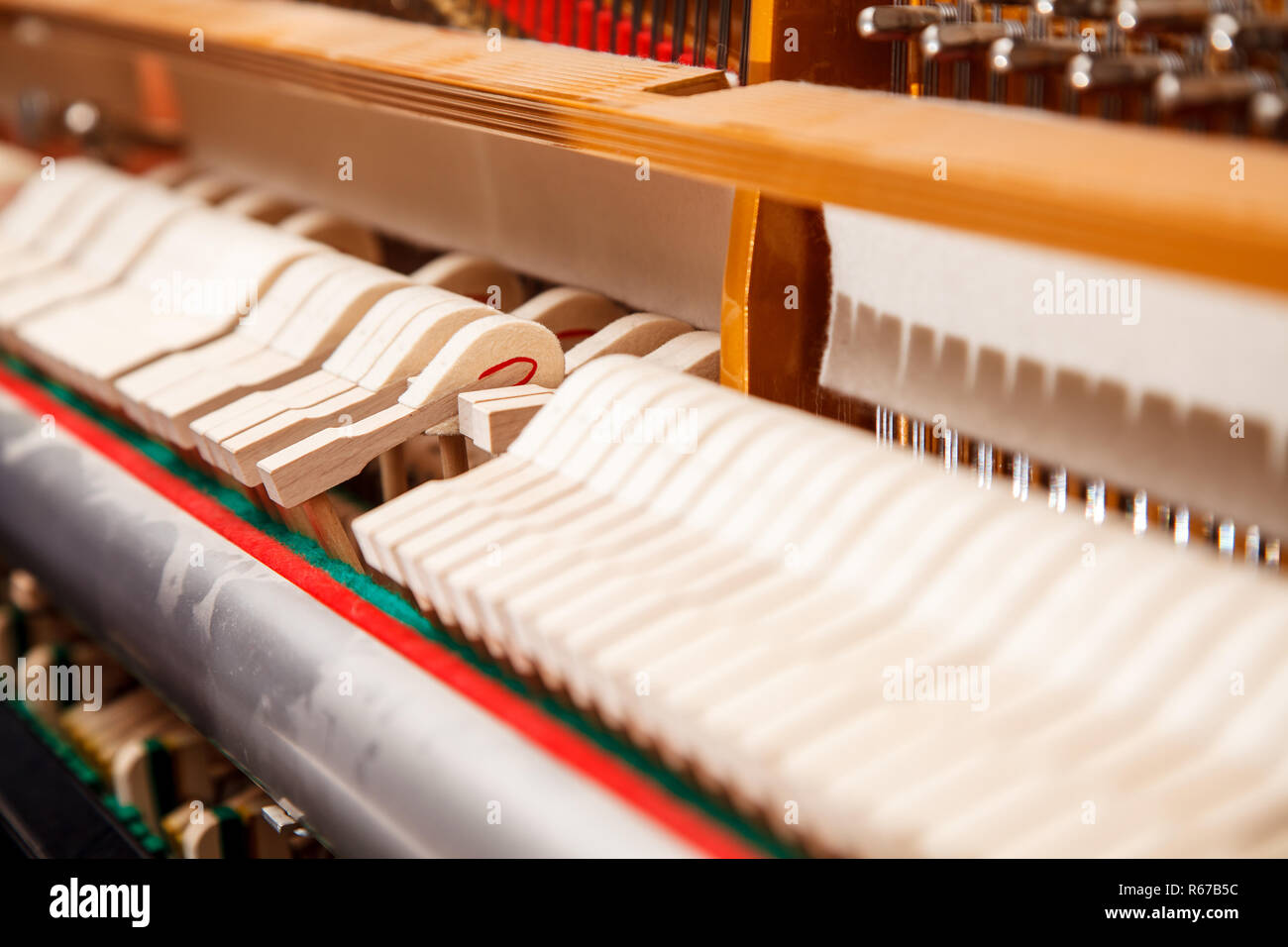 new modern piano with open strings indoor closeup Stock Photo - Alamy
