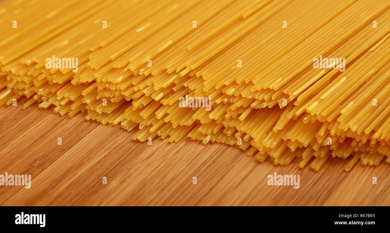 Close up background of spaghetti pasta Stock Photo - Alamy