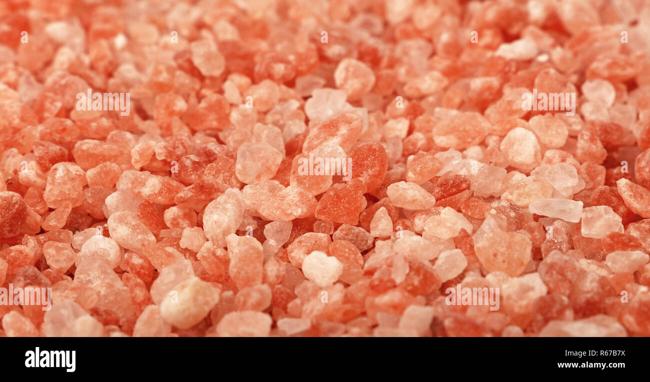 Close up background of pink Himalayan salt Stock Photo - Alamy