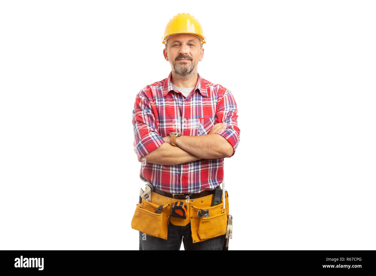 Serious builder portrait with proud expression and crossed arms ...