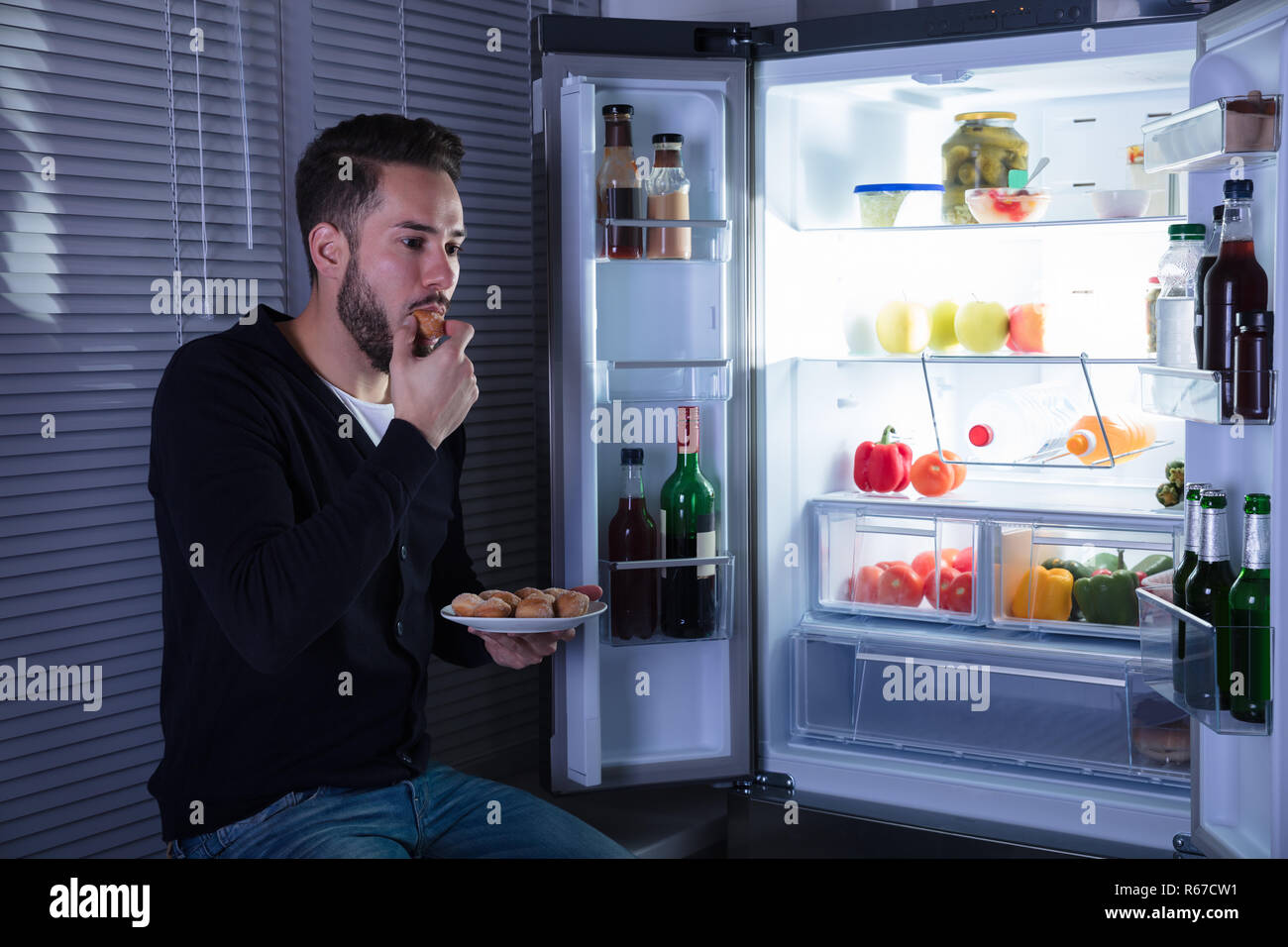 Man Eating Cookie Stock Photo - Alamy