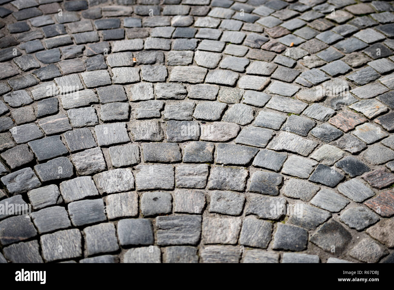 Old cobblestone road in city of Europe Stock Photo - Alamy