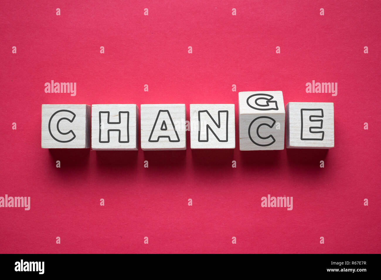 Wooden cube with word change to chance Stock Photo - Alamy