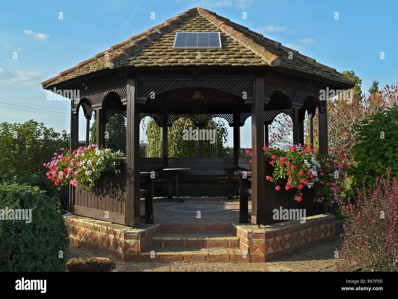 Wooden open hut with table and benches for relaxing Kovilj monastery ...