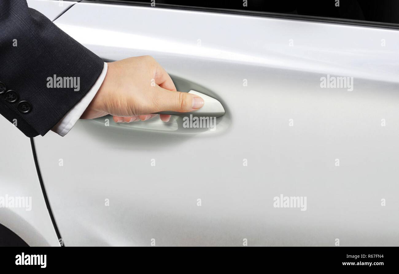 Hand open car door Stock Photo - Alamy