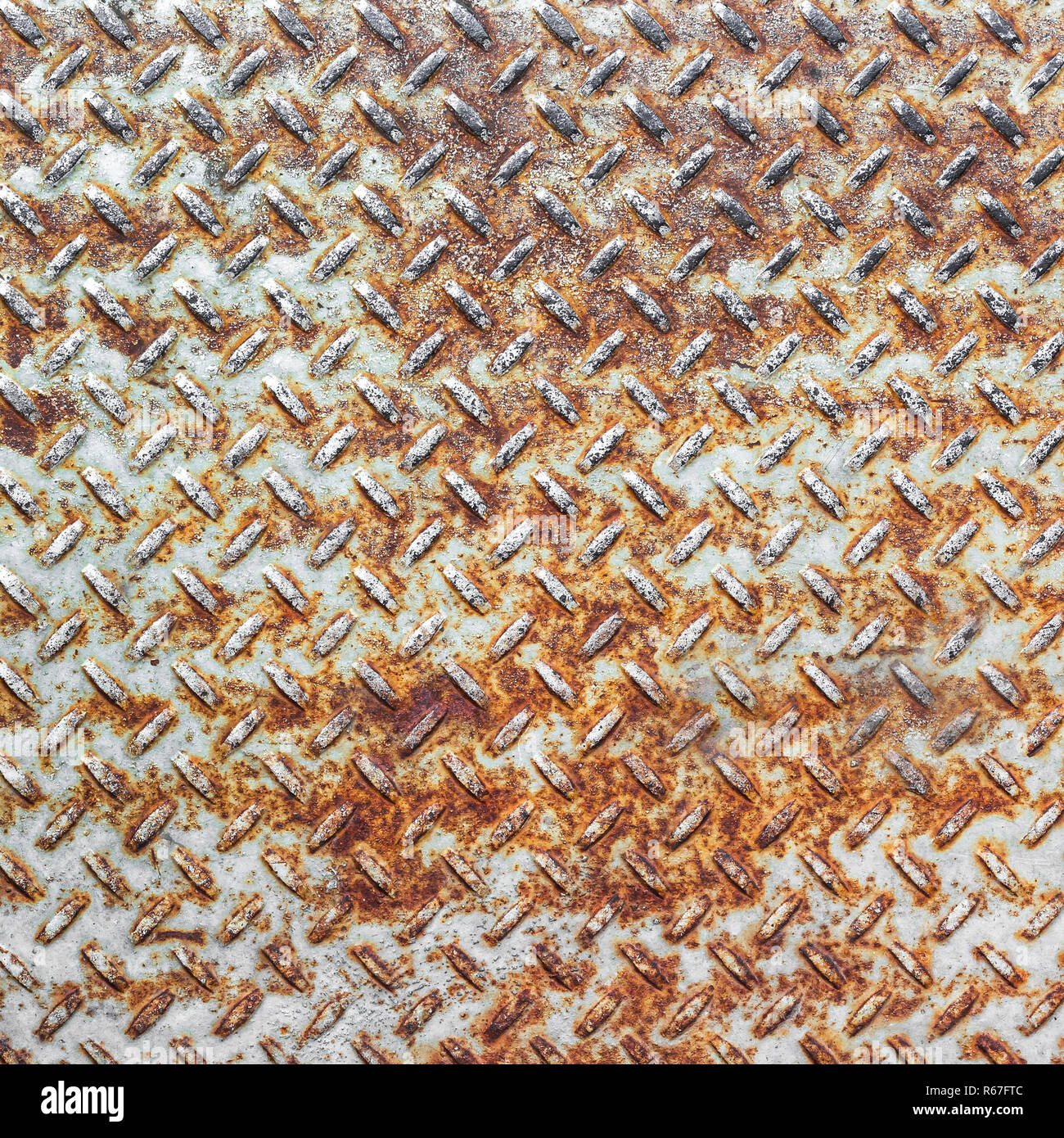 Rusted metal with diamond pattern Stock Photo - Alamy