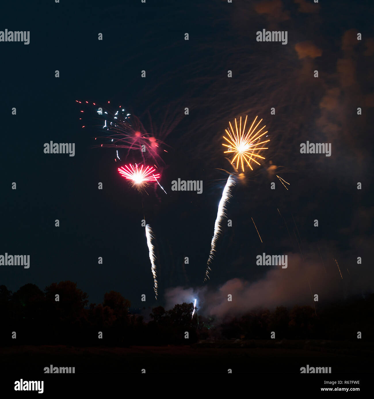 the colors of the fireworks in the night Stock Photo - Alamy