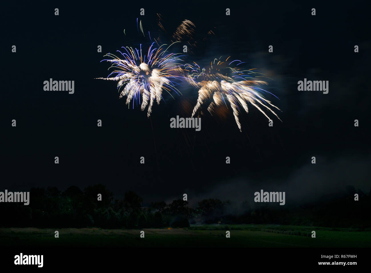 the colors of the fireworks in the night Stock Photo - Alamy