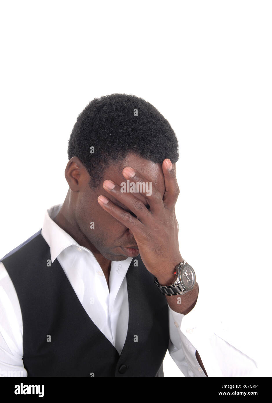 Black man covering his face Stock Photo - Alamy