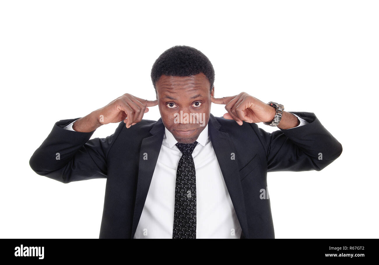 Business man finger in ears hi-res stock photography and images - Alamy