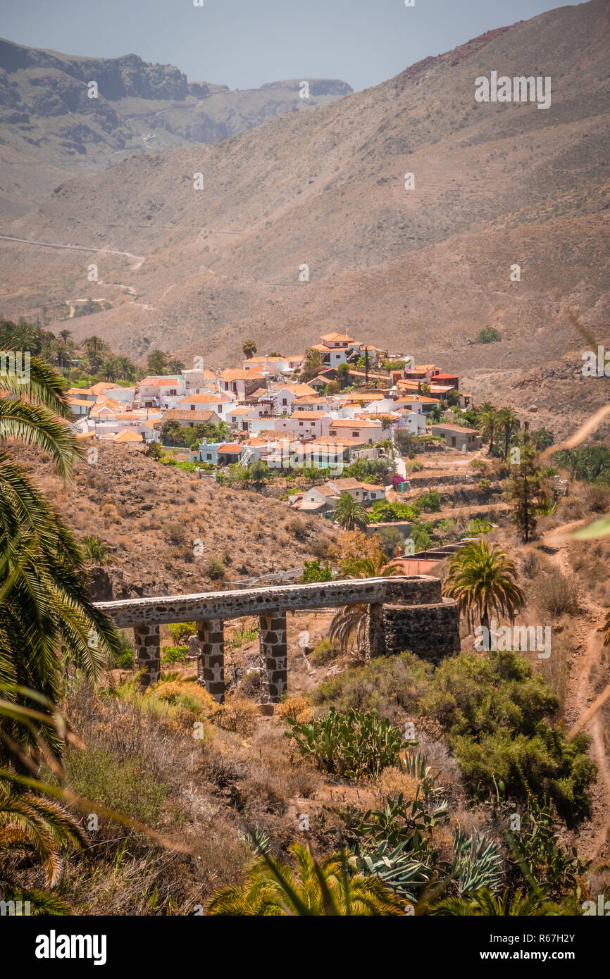 Ancient mill and aqueduct in Fataga Stock Photo - Alamy