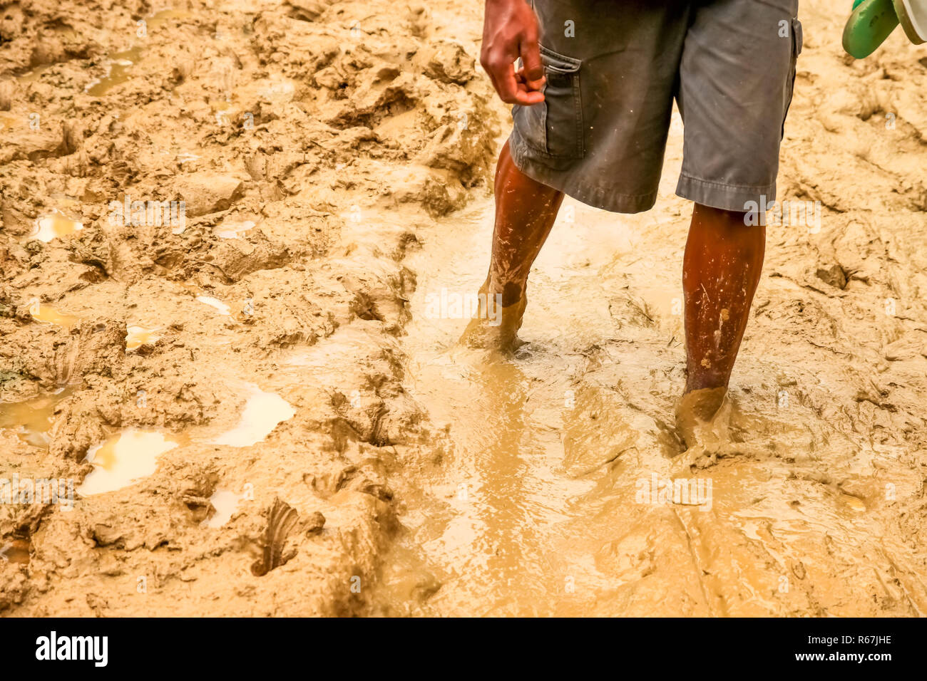 Walking in mud Stock Photo - Alamy
