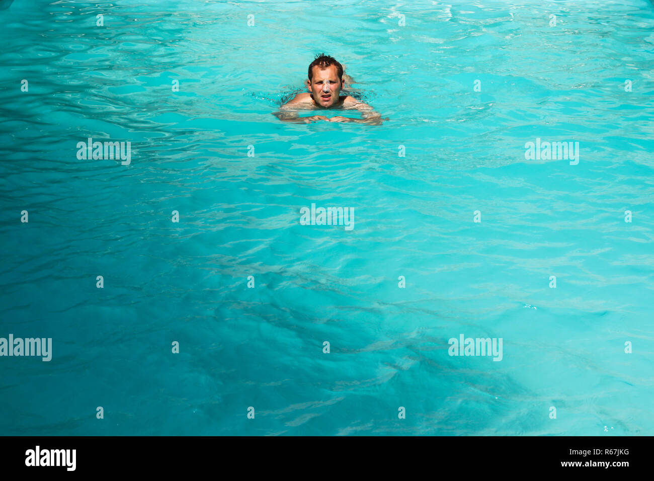 Man swimming pool outdoors muscles hi-res stock photography and images ...