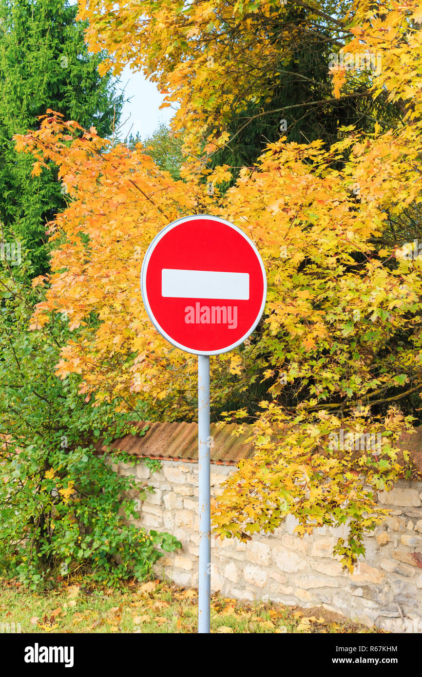 Stop sign against forest background Stock Photo - Alamy