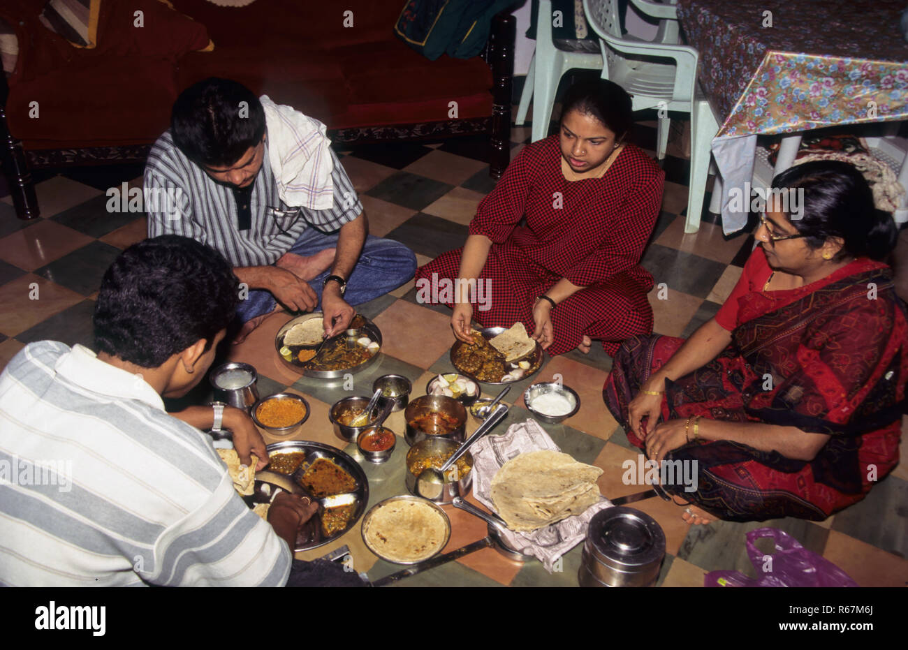 Family taking Lunch together Stock Photo - Alamy