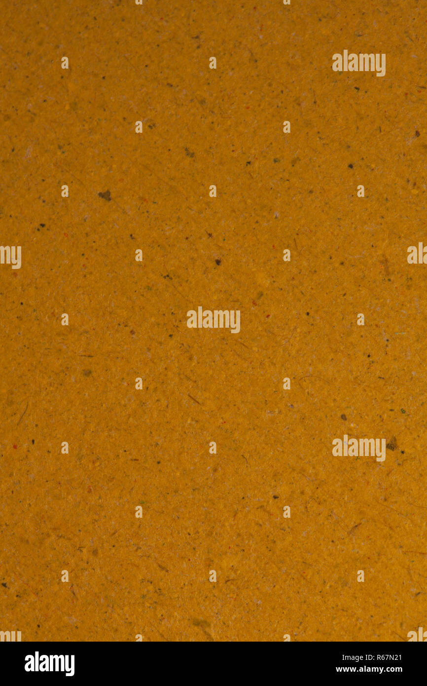 Dark yellow cardboard background Stock Photo - Alamy