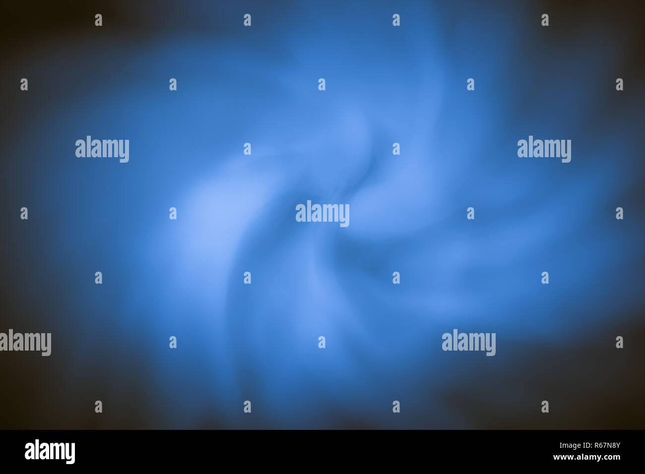 Blue glowing spinning spiral hi-res stock photography and images - Alamy