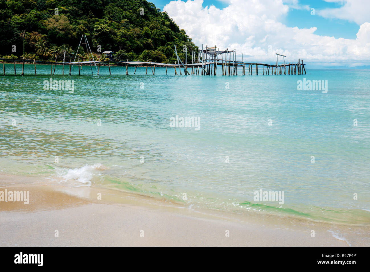 Wooden bridge on beach in island with the sky Stock Photo - Alamy