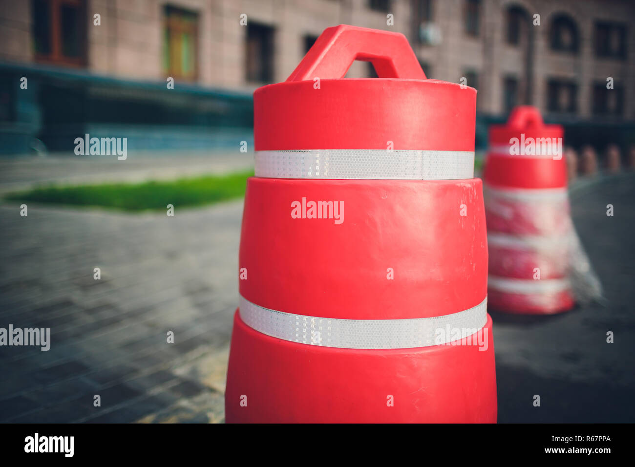 road red plastic block safety fencing repair work on carriageway ...