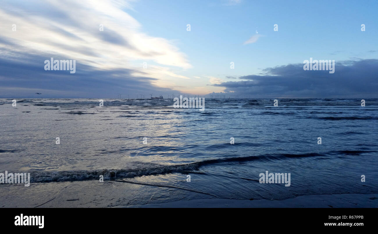 Sunset on Crosby Beach Stock Photo - Alamy