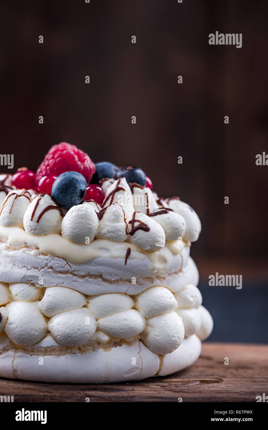 Traditional pavlova dessert with berry fruits Stock Photo - Alamy