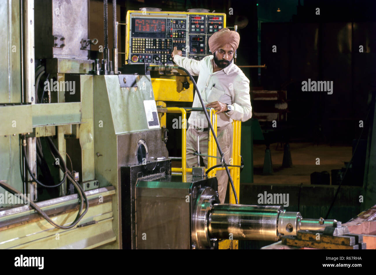 Employees in factory hi-res stock photography and images - Alamy