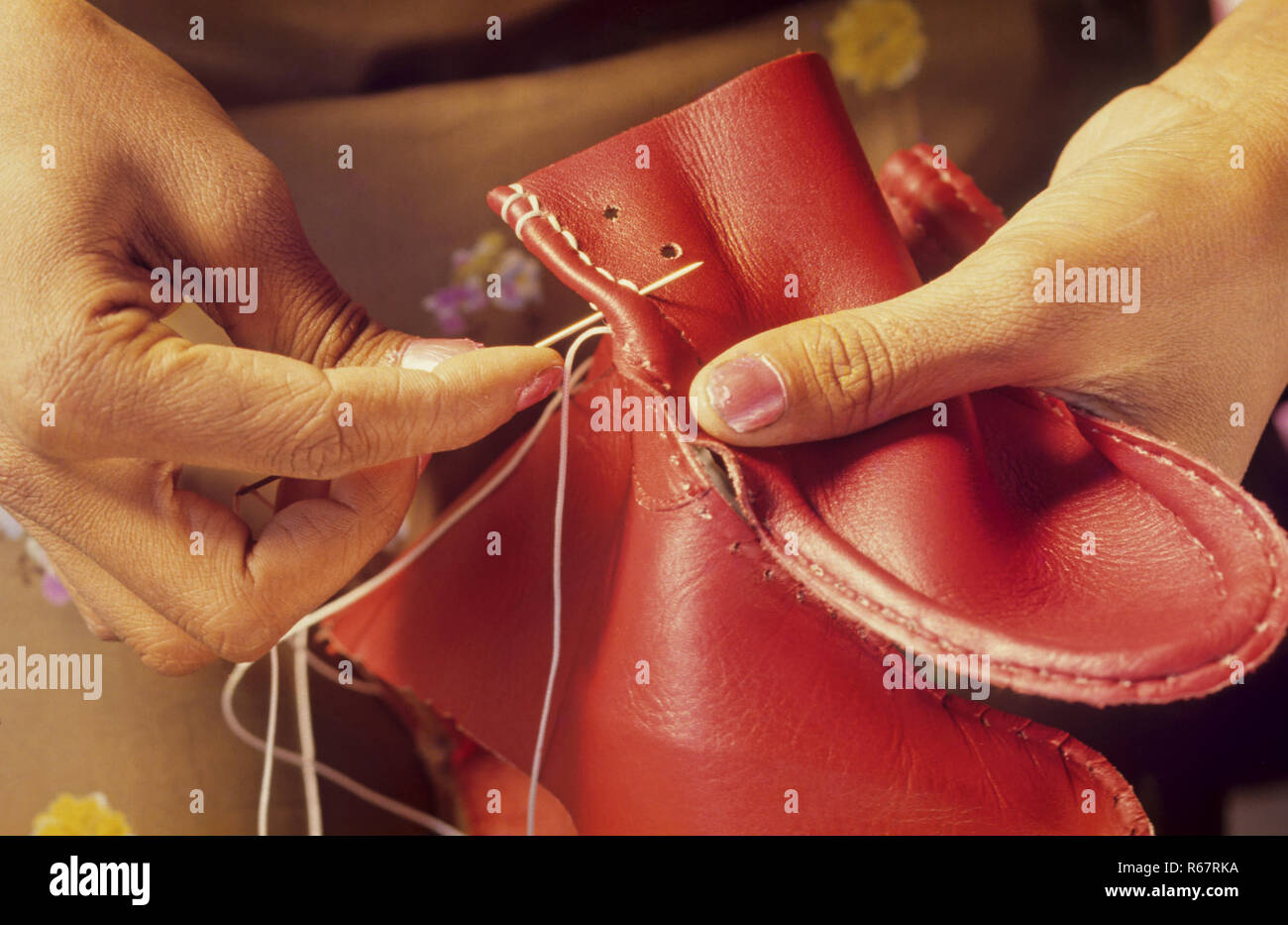 woman Sewing Leather shoes Stock Photo - Alamy
