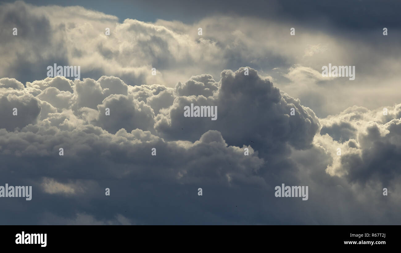 Fluffy clouds from strong hi-res stock photography and images - Alamy