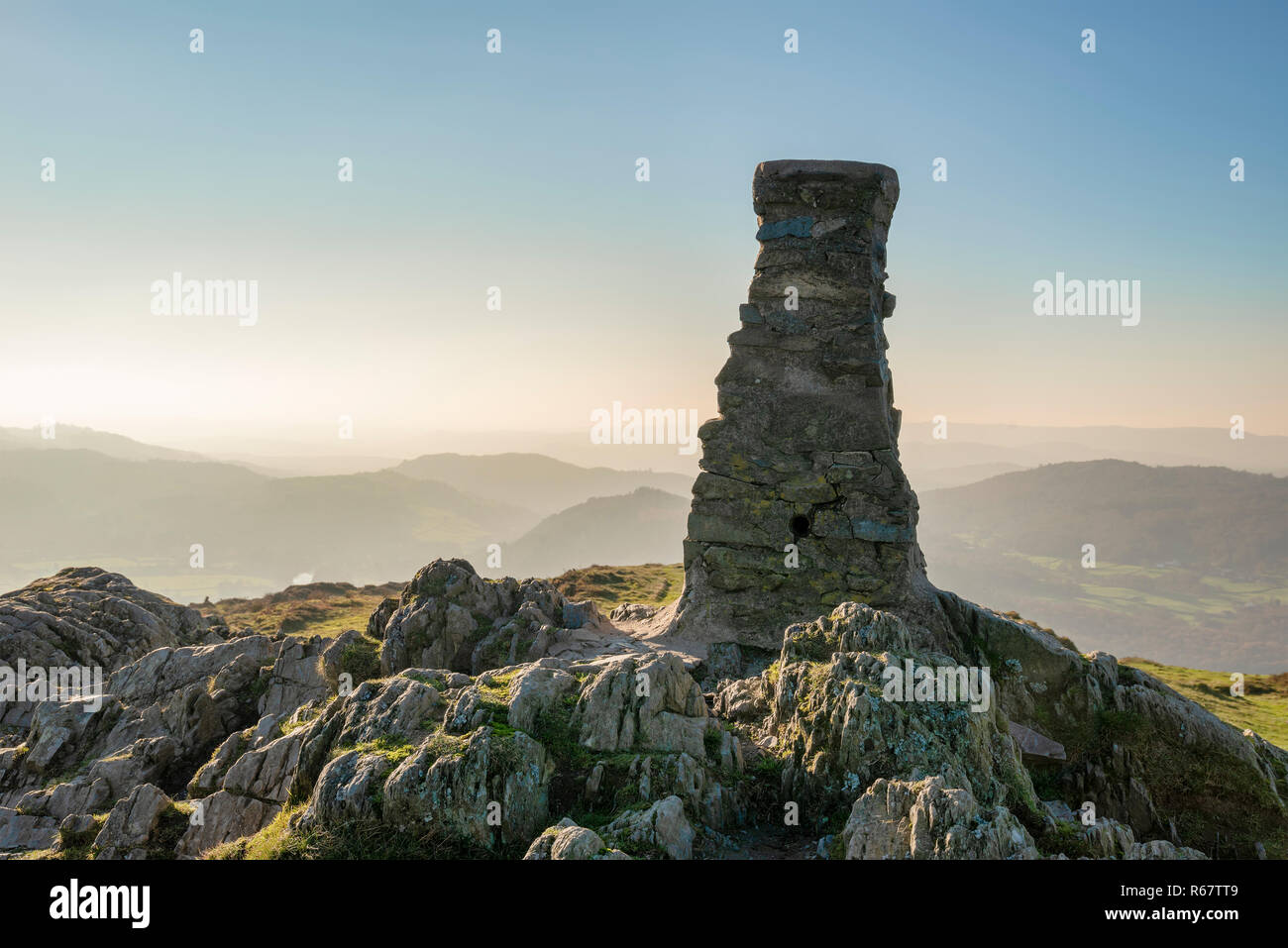 The trig point at the top of Gummer's How in the Lake District with ...