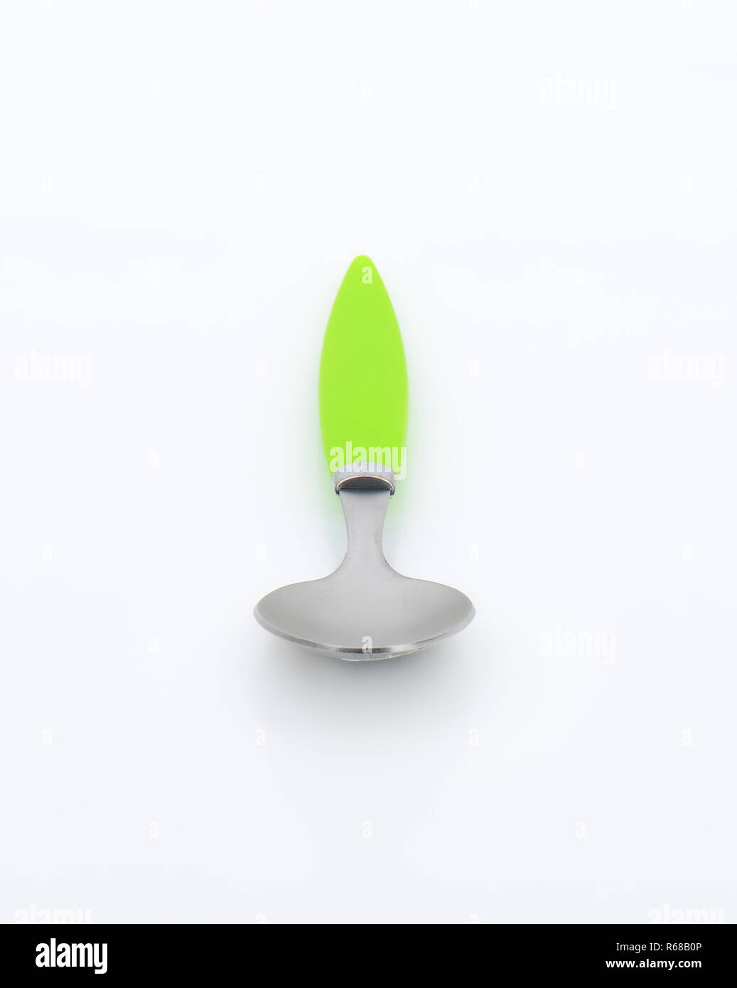 Empty teaspoon on white background Stock Photo - Alamy