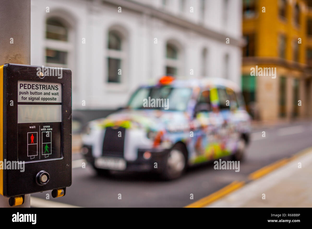 Colorful taxi at a pedestrian crossing Stock Photo - Alamy