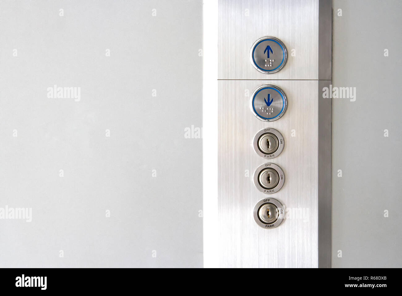 Press the elevator up and keypad elevator Stock Photo - Alamy