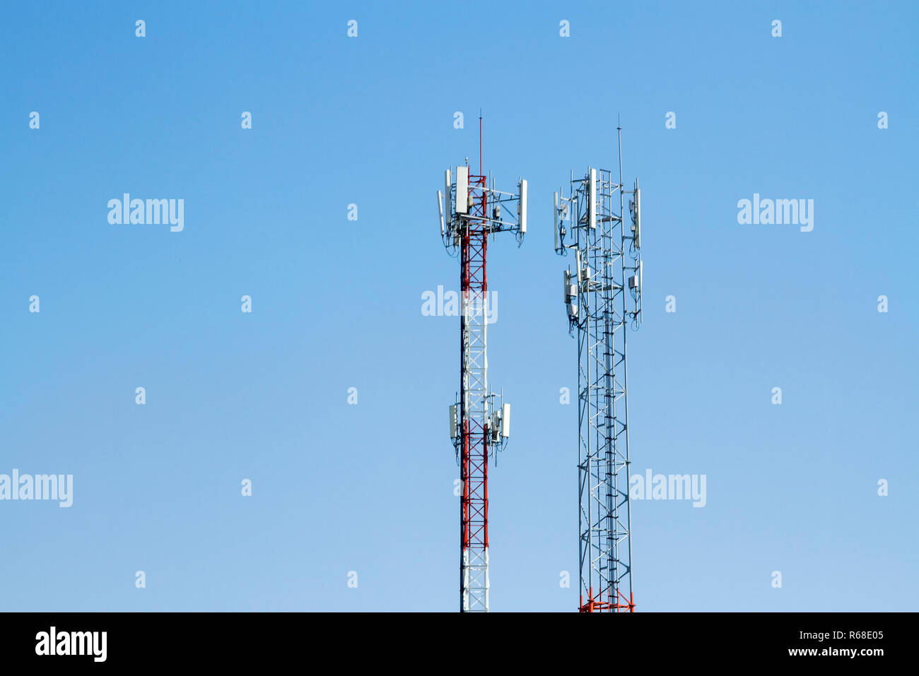 Mobile phone communication tower transmission signal with blue sky ...