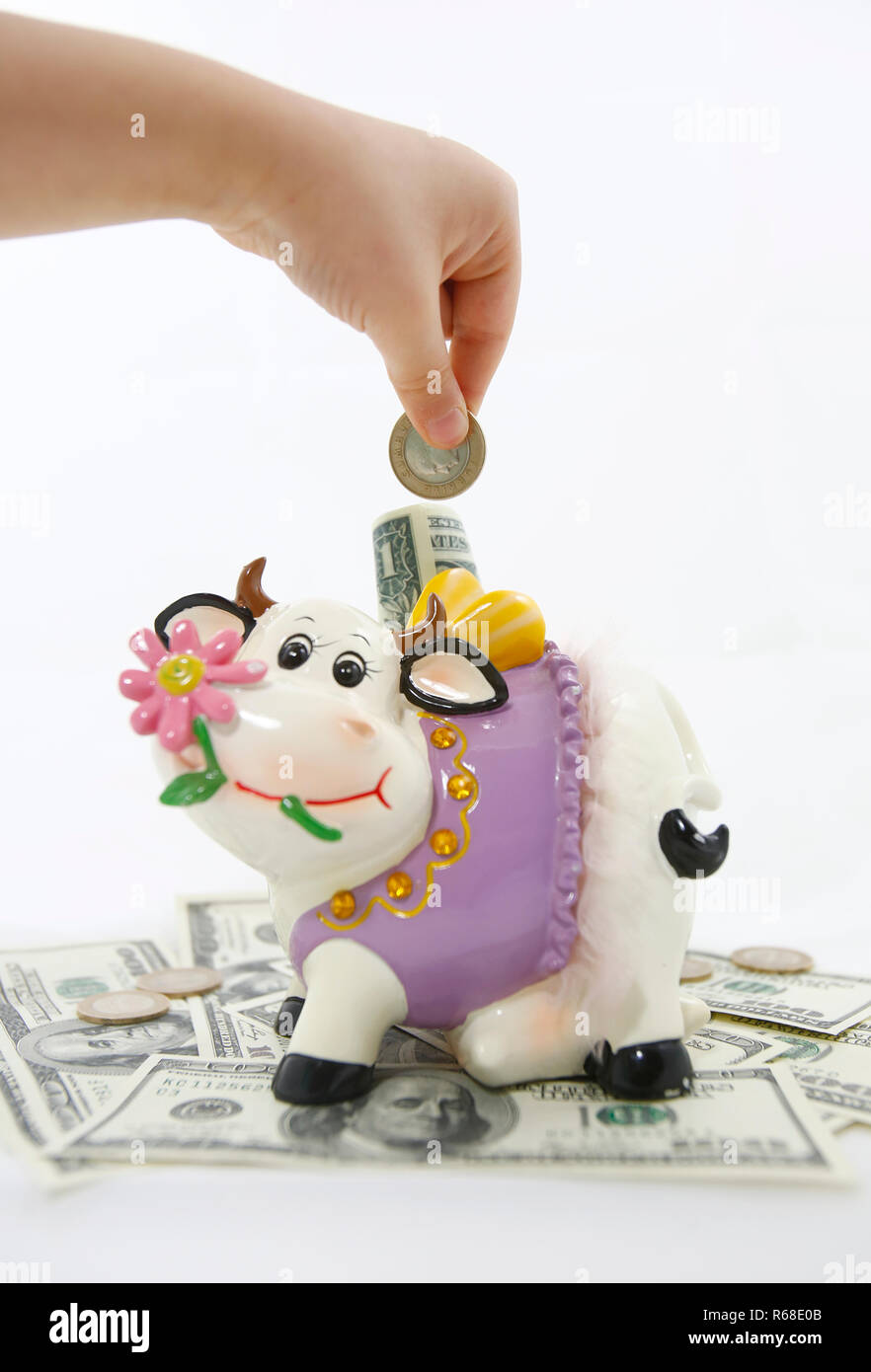 Cow coin bank Stock Photo - Alamy