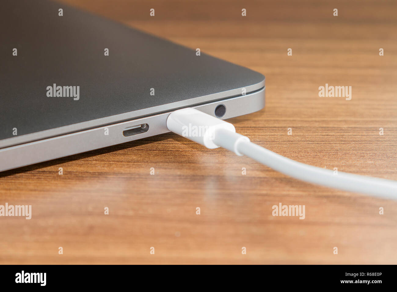 USB type-C port and Cable's White of laptop Stock Photo - Alamy