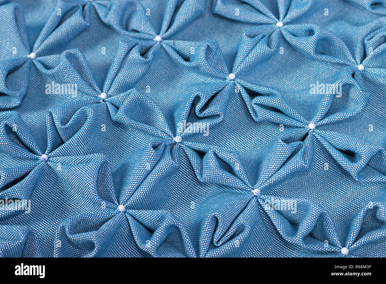 Close up background of blue textile puffs Stock Photo - Alamy