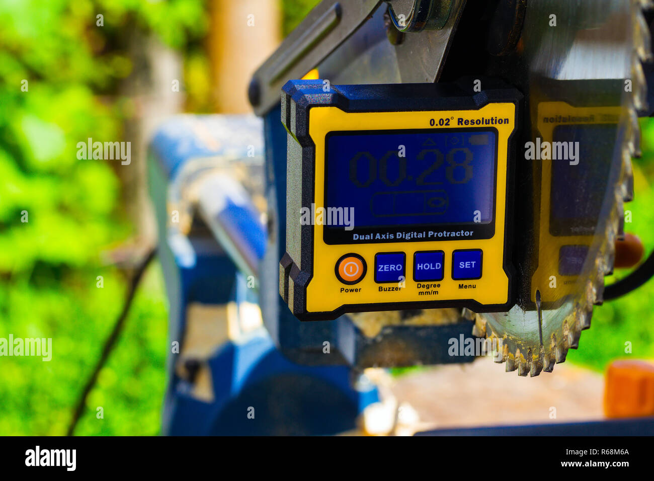 digital protractor and circular saw blade Stock Photo - Alamy