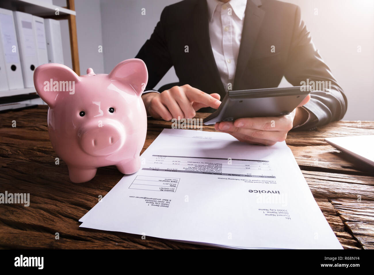 Businessperson Checking Invoice In Office Stock Photo - Alamy